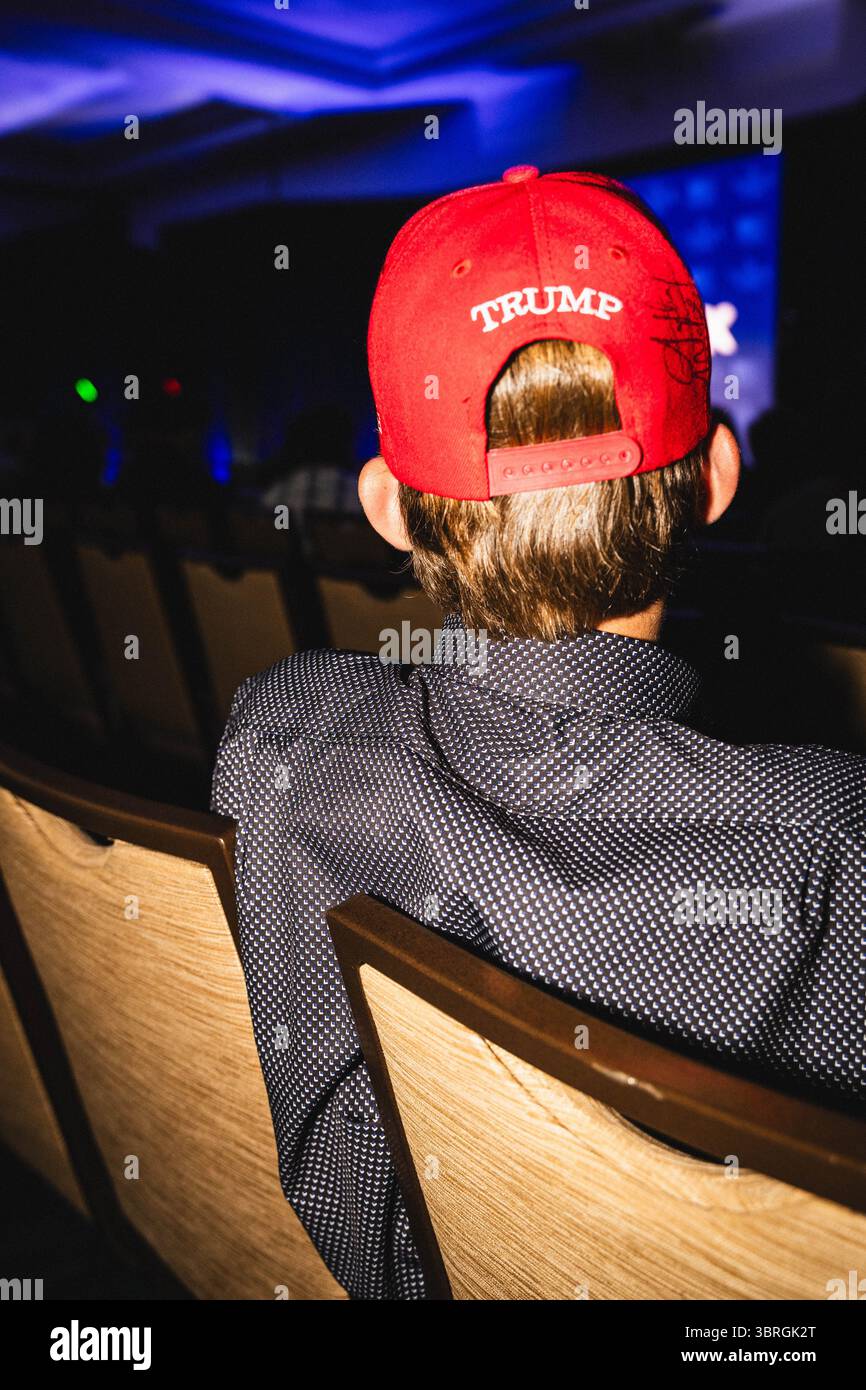 Tampa, Florida, USA. 12th July, 2025. A MAGA supporter dawns a Trump ...