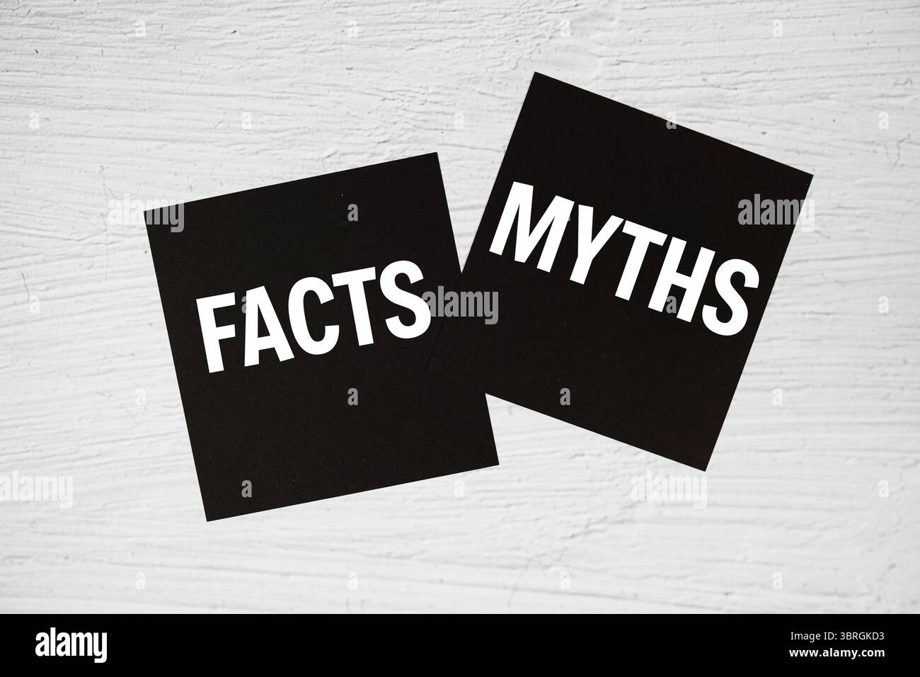 Facts vs Myths text message on stick note on concrete background Stock ...
