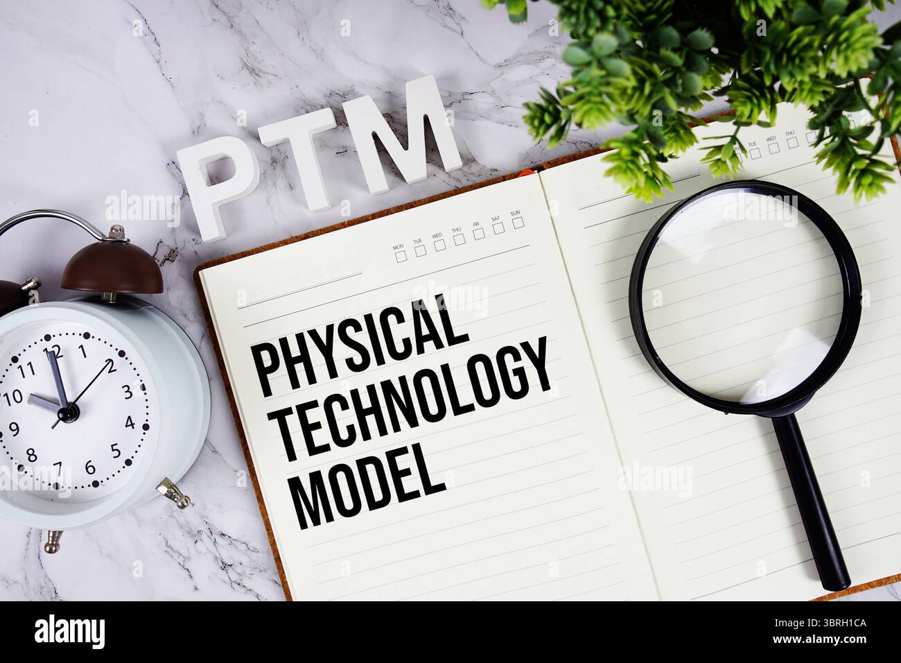 PTM - Physical Technology Model acronym on notepad, Business concept ...