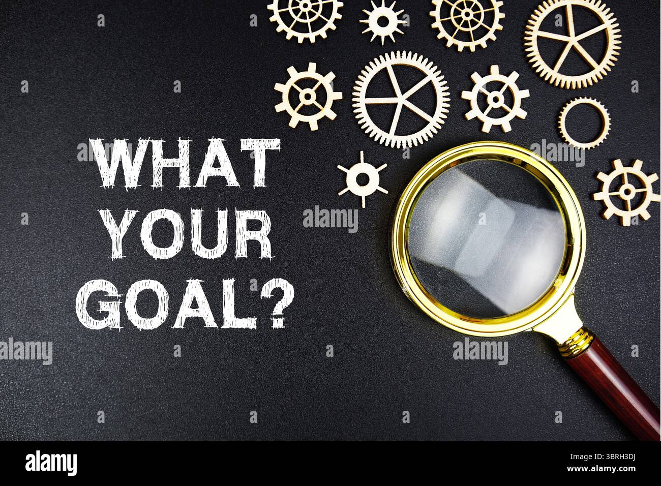 What Your Goal? text message with magnifying glass on black background ...