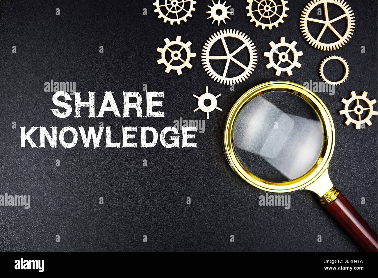 Share Knowledge text message with magnifying glass on black background ...