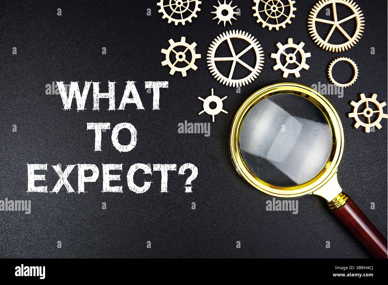 What to Expect? text message with magnifying glass on black background ...