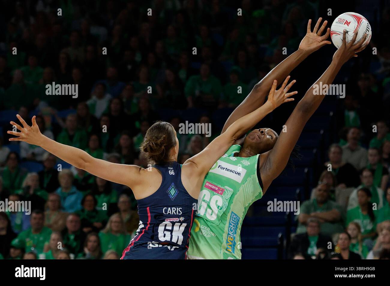 Jhaniele Fowler-Nembhard of the Fever and Maggie Caris of the Vixens ...