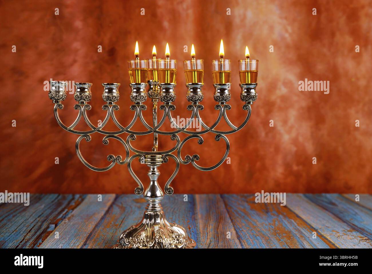 Fifth day of jewish holiday the three Hanukkah candles are burning on ...