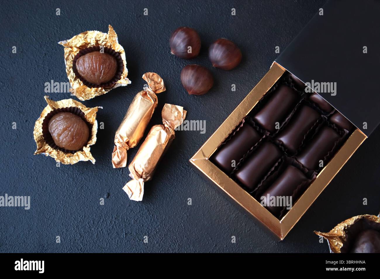 Traditional Turkish dark chocolate covered chestnuts in an elegant box ...