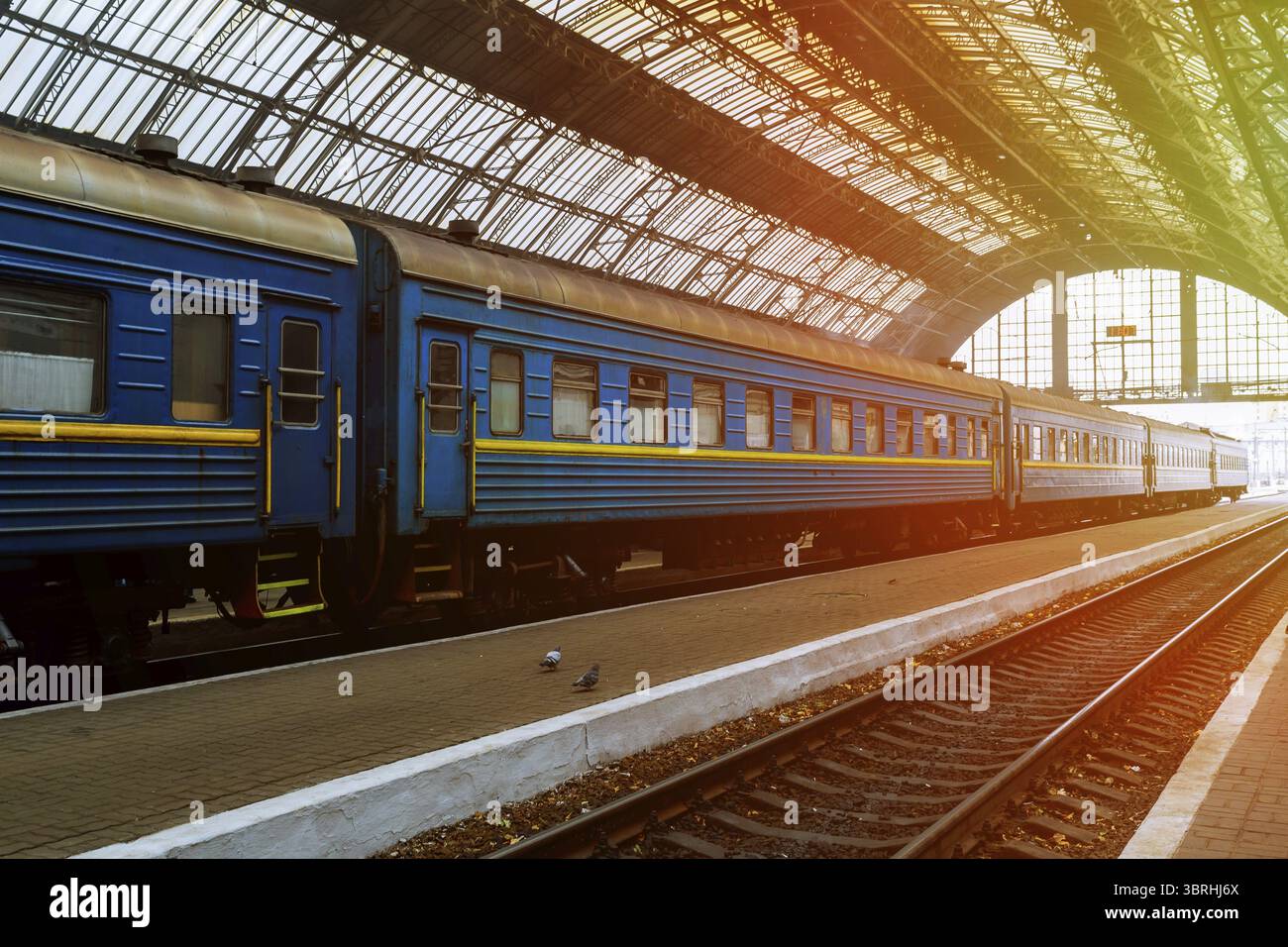 Lviv Central Station trains stand at the station at sunrise time Stock ...