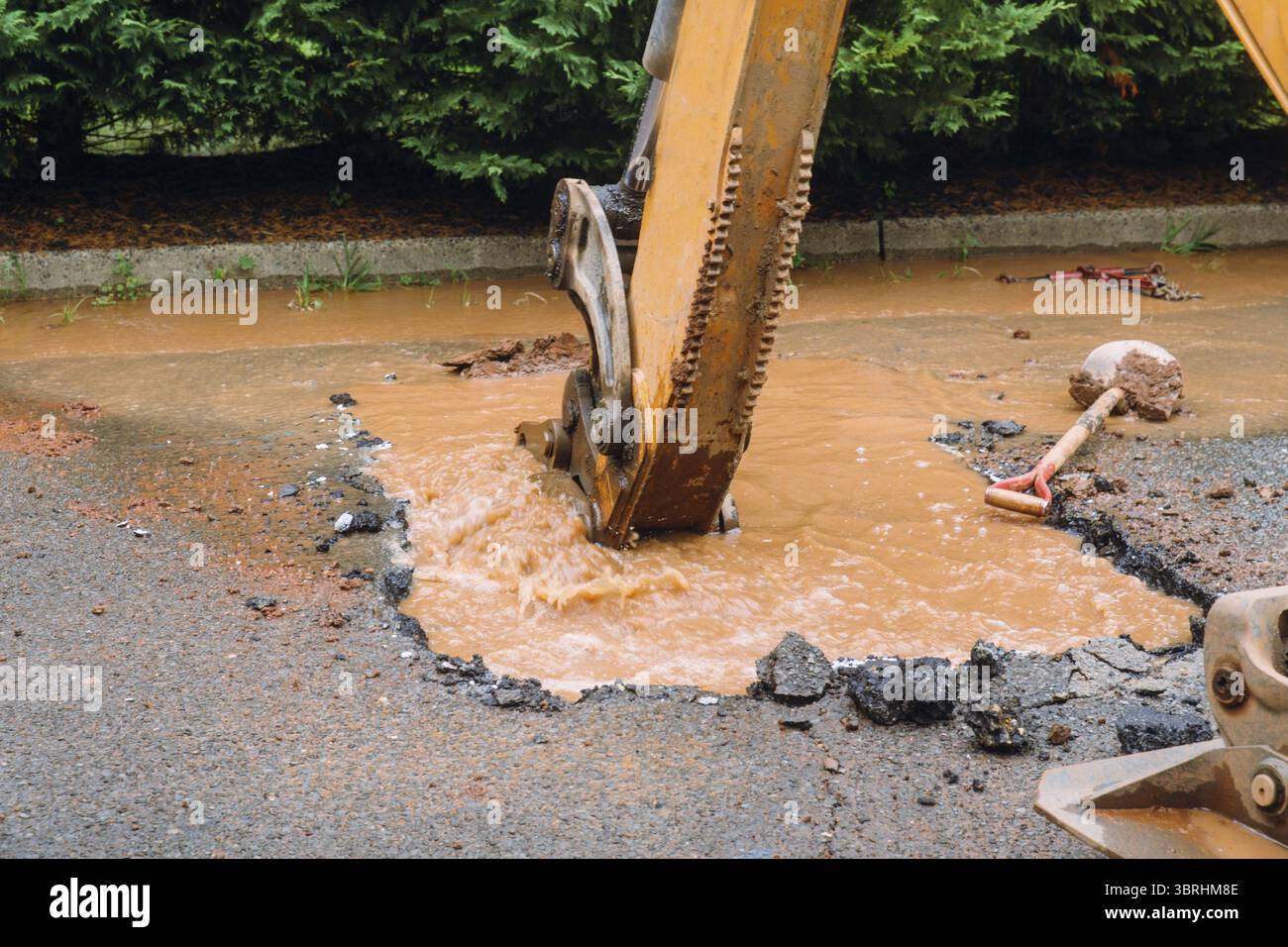 Repair the broken pipe for domestic water on the mud ground Stock Photo ...