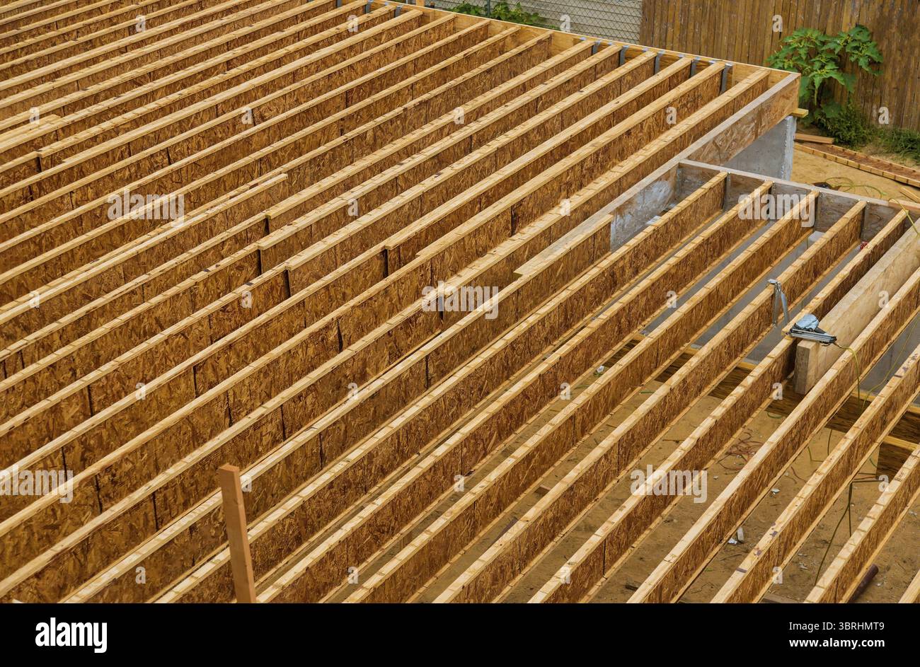 Engineered wood floor joist on a new custom house framing floor joists ...