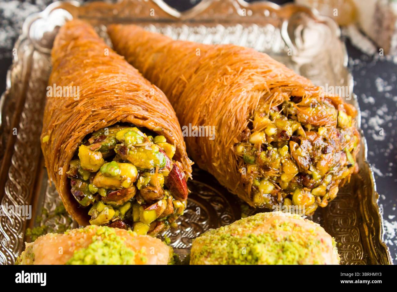 Traditional Turkish Dessert, two types of Baklava in a silver tray ...