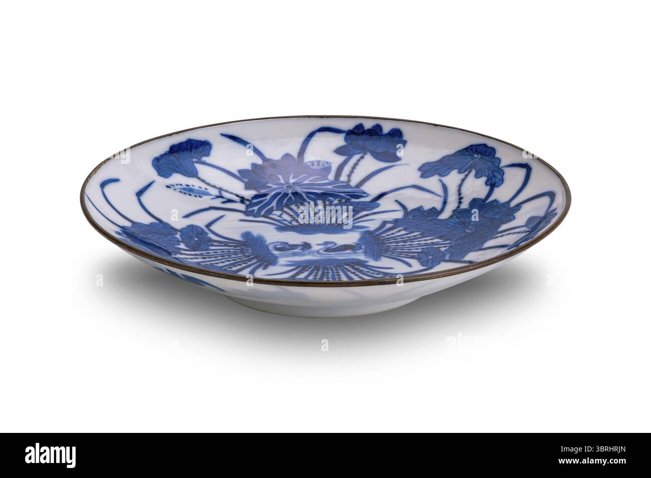 Closeup view of old blue pattern chinese ceramic plate isolated on ...