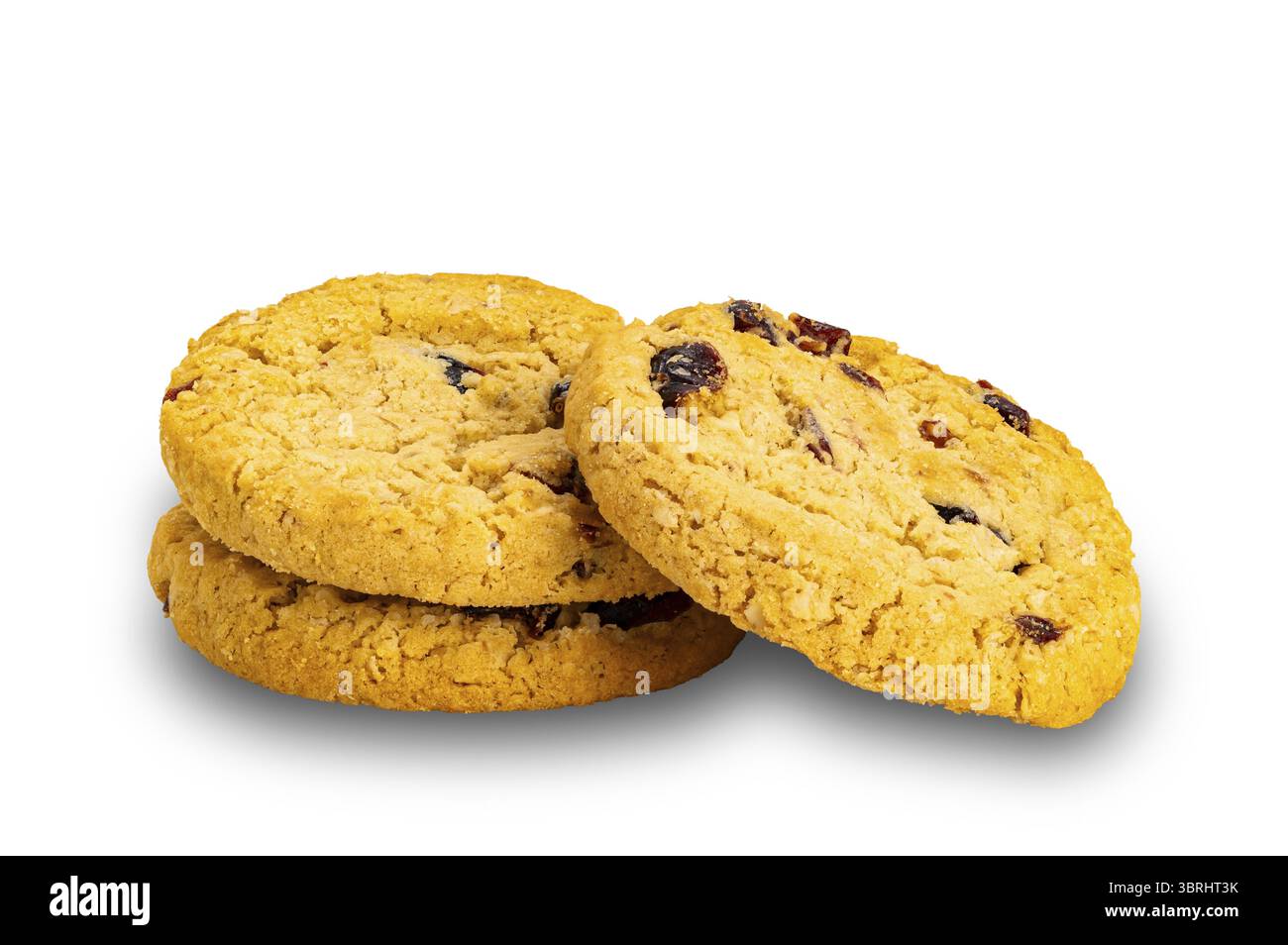 Pile of homemade circular oat flakes and cranberry biscuits isolated on ...