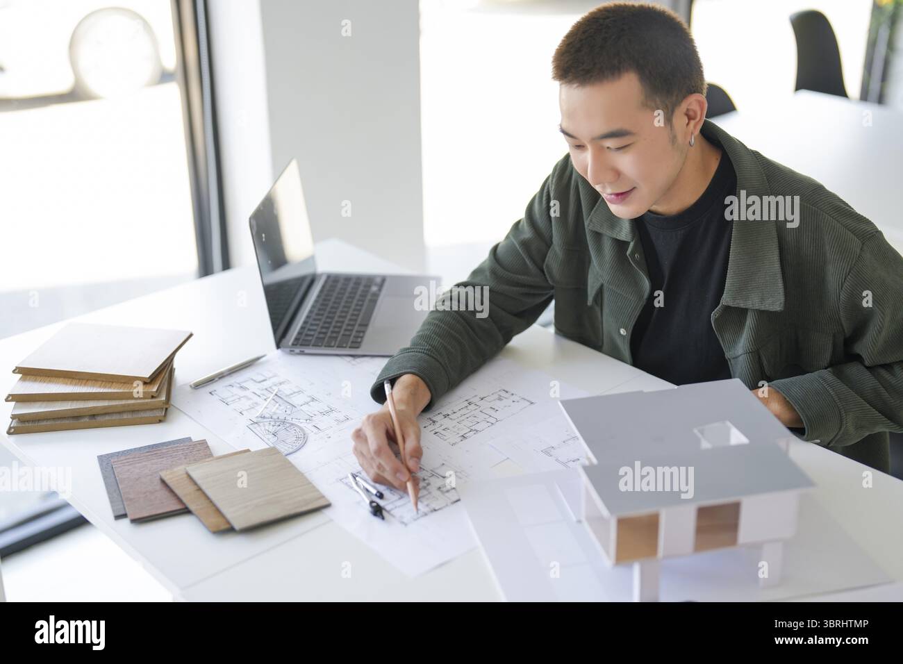 Architecture Man drawing on architectural Creative project business ...