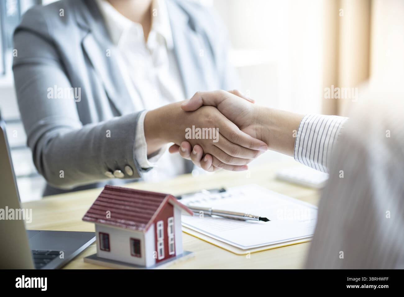 Businessman shaking hands successful making a deal. mans handshake ...