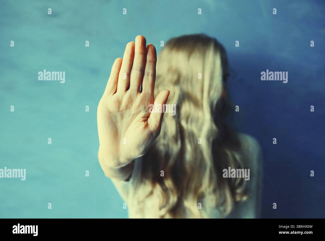 Upset crying middle-aged woman shows stop sign with palm of hand ...