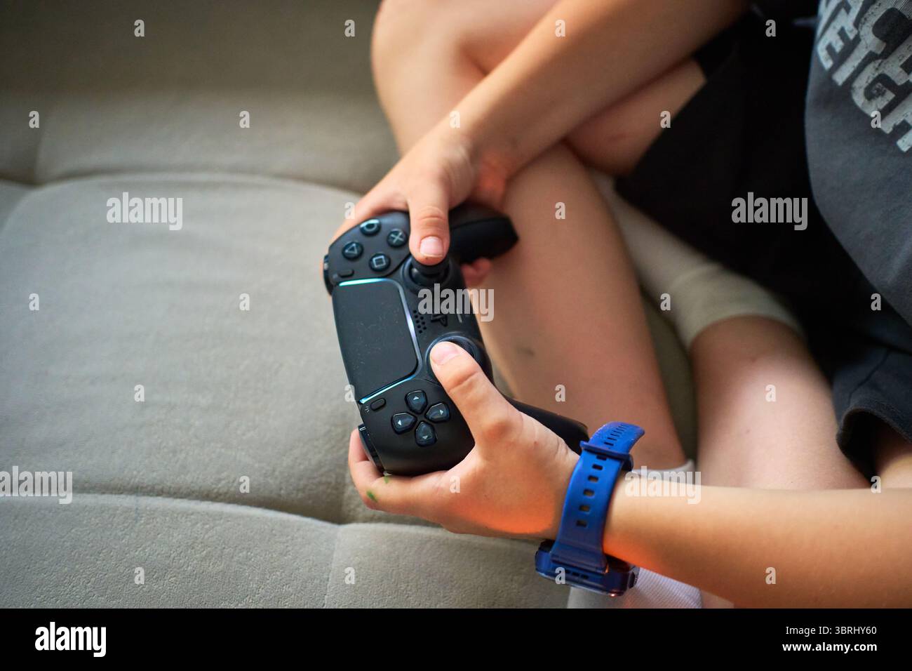 Tyumen, Russia-July 8, 2025: Sony PlayStation 5 Child engages in gaming ...