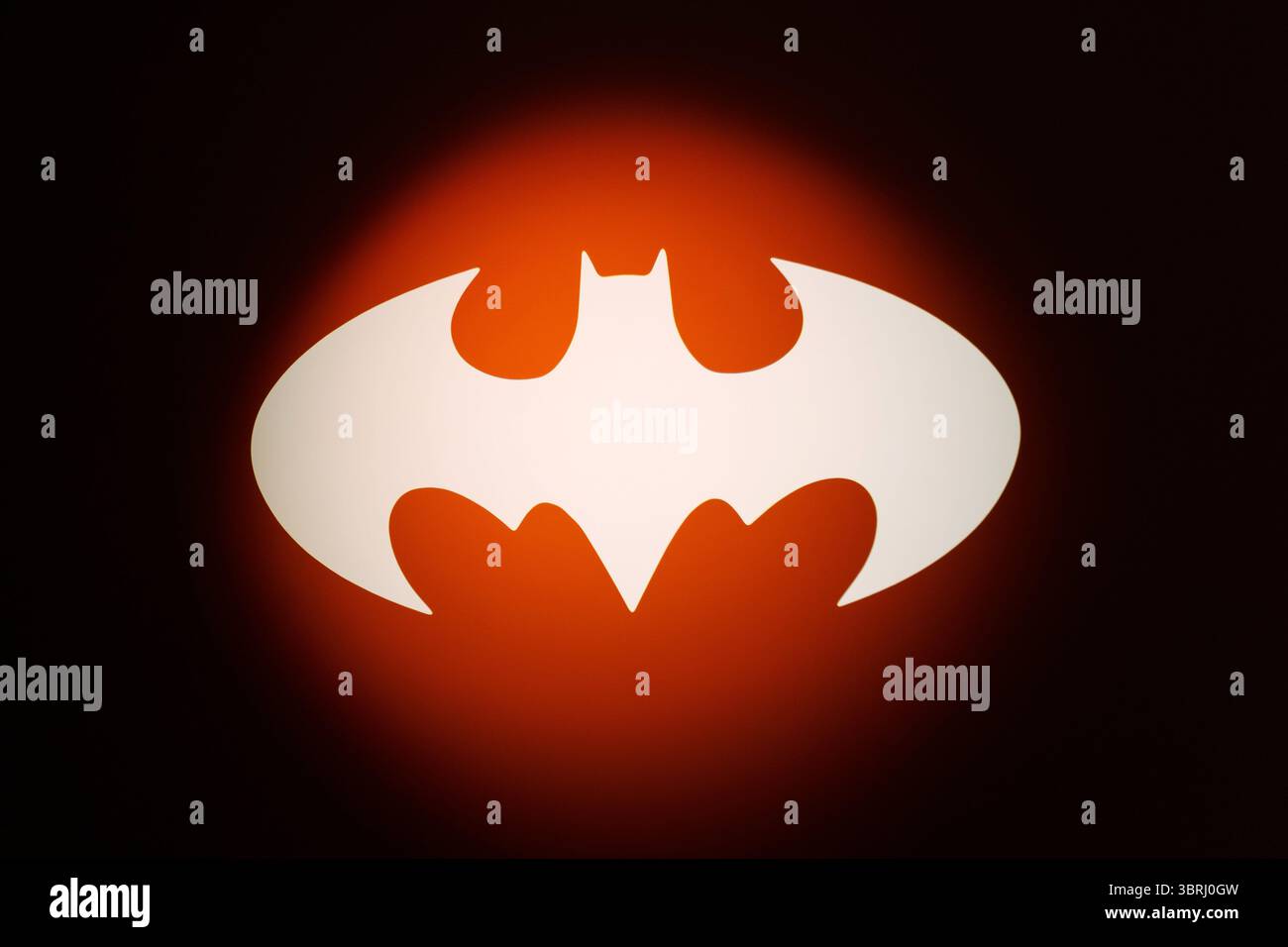 Tyumen, Russia-May 01, 2025: prominent bat symbol illuminates a dark ...
