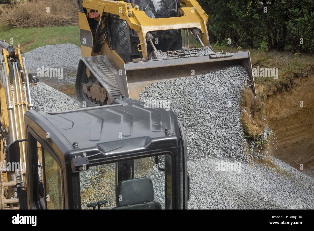 Close up excavator working on a construction site, excavator bucket ...