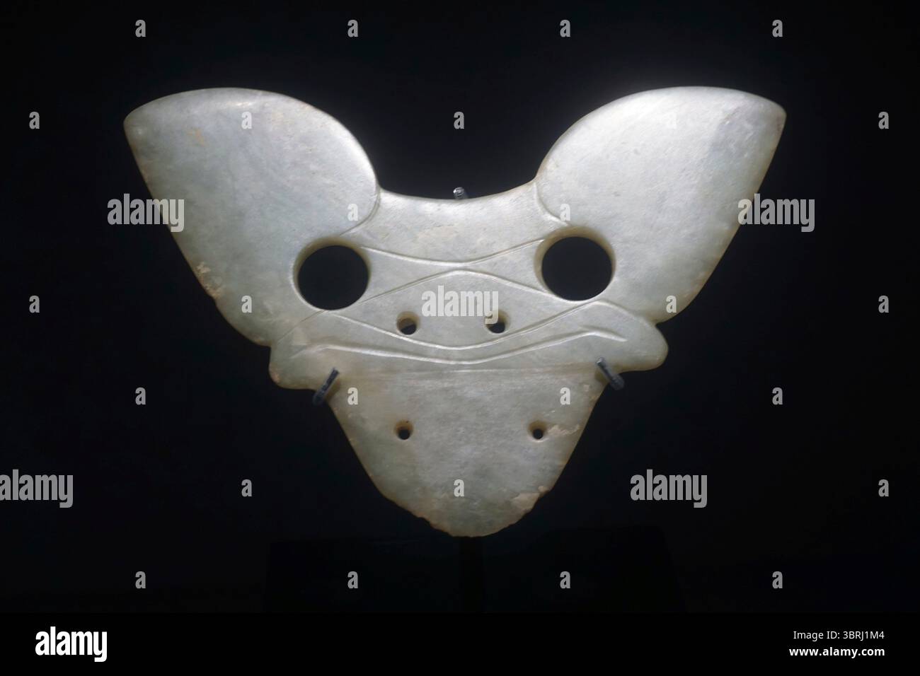 A jade artifact from Hongshan Culture, about 5,500 years ago, in a ...