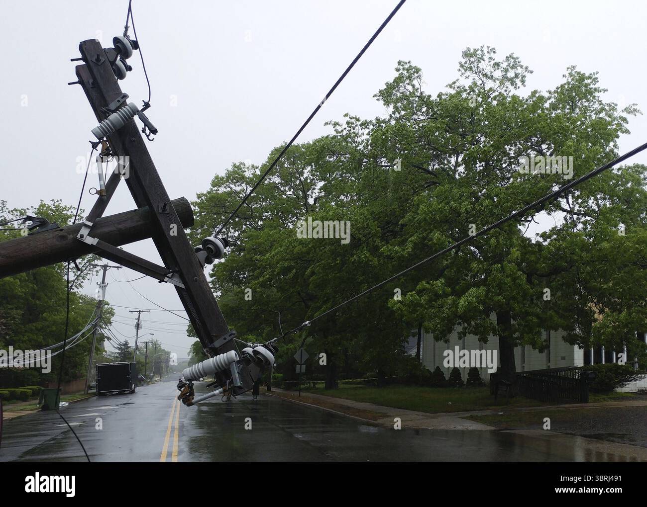The storm caused severe damage to electric poles power lines over a ...