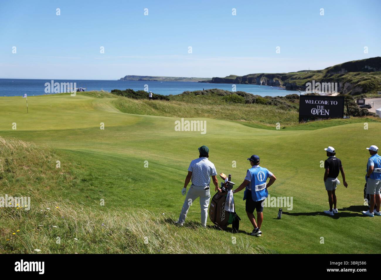 US golfer Rickie Fowler prepares to chip onto the 5th green during a ...