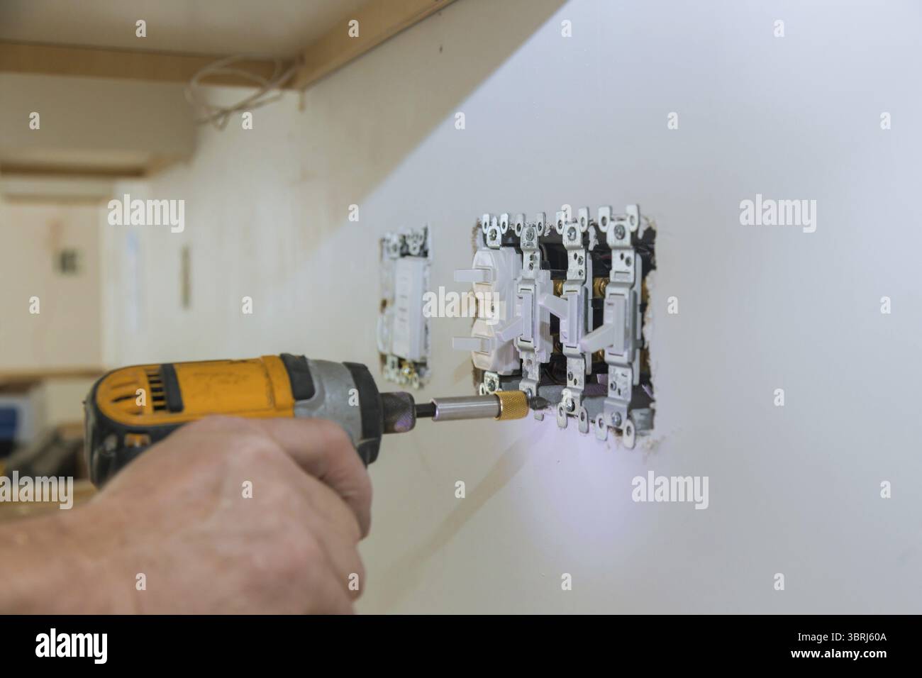 Work on installing electrical outlets with electrical wires and ...