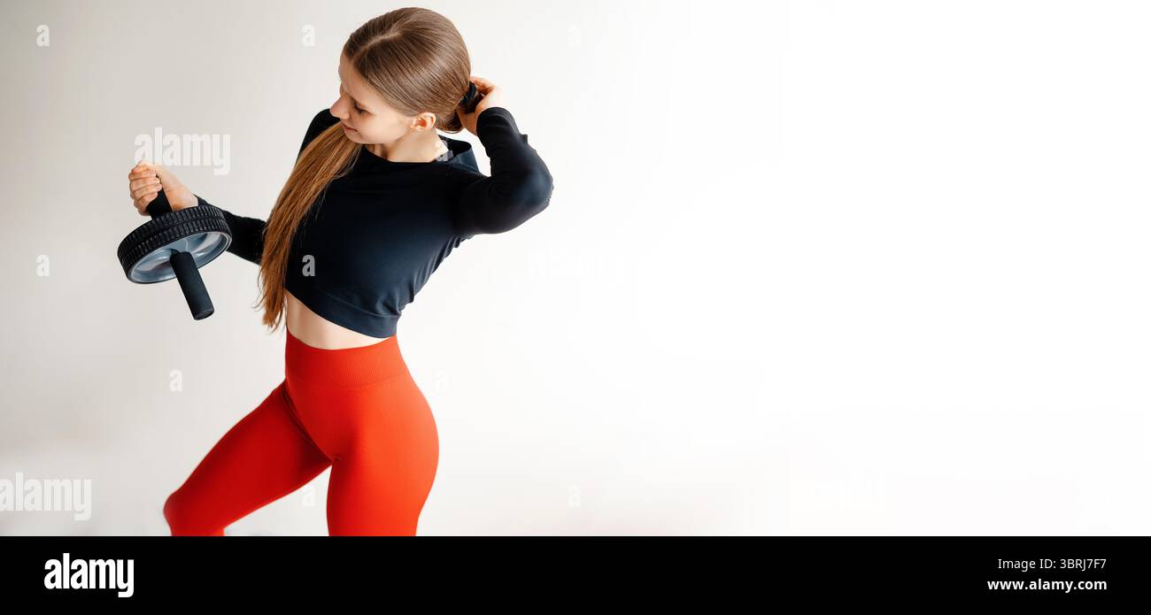 High angle view of attractive slim lady in stylish workout clothes ...