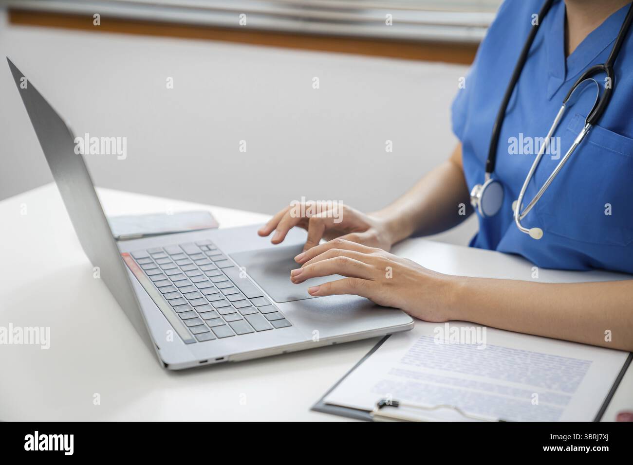 Medical technology network team meeting concept. doctor hands typing on ...