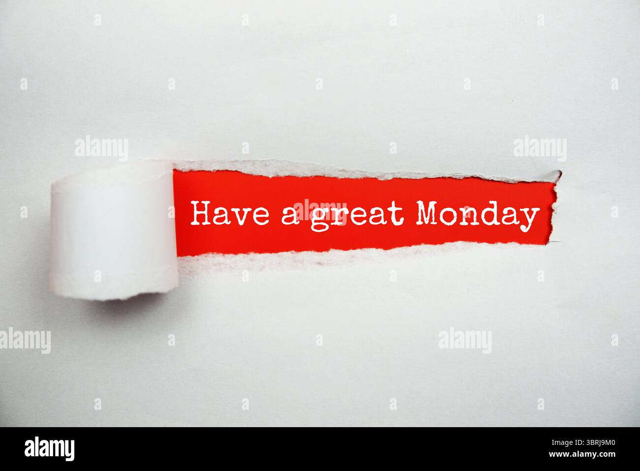 Have A Great Monday message written on red paper with torn paper ...