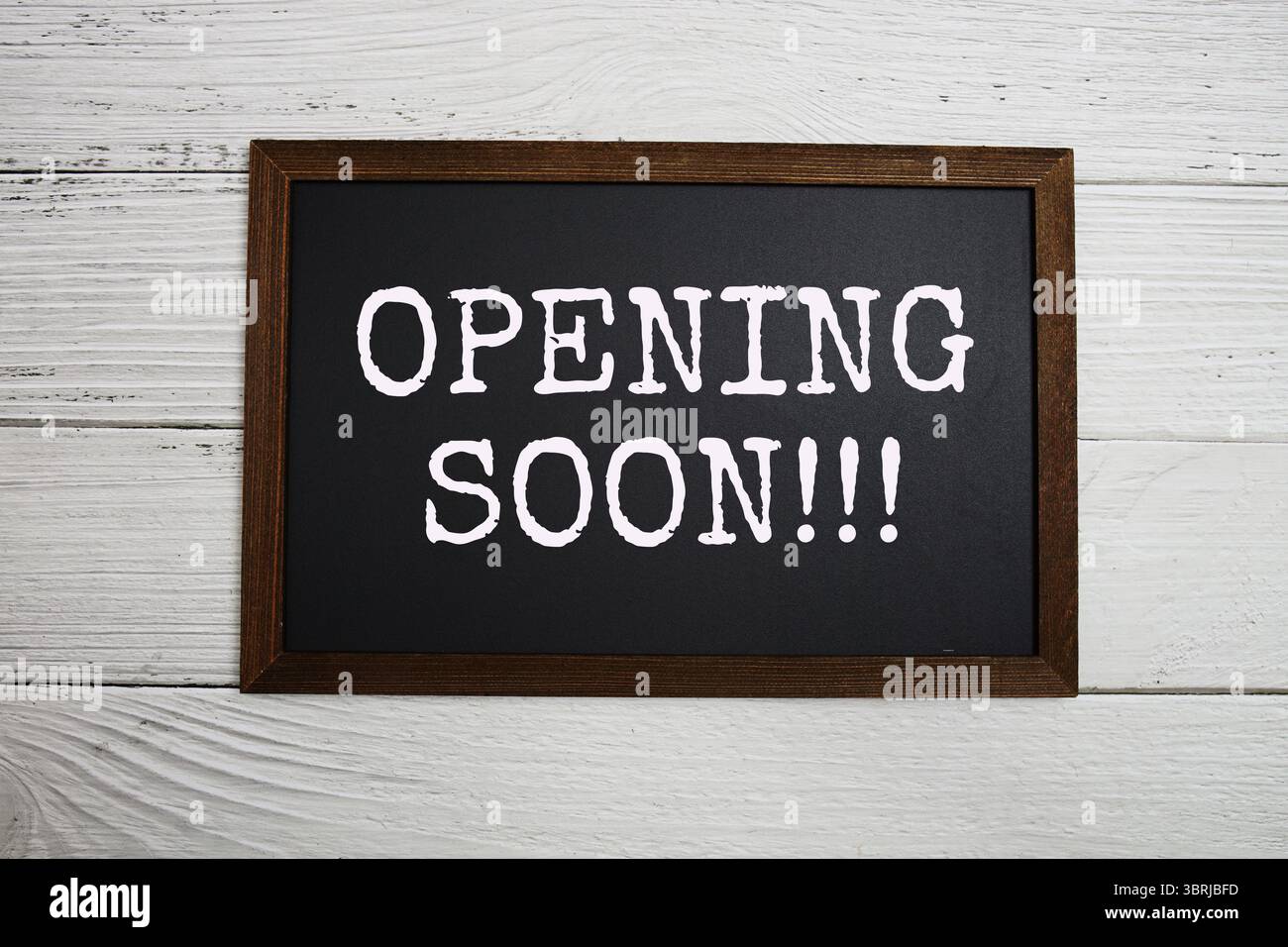 Opening Soon!!! text with blackboard on white brick background Stock ...