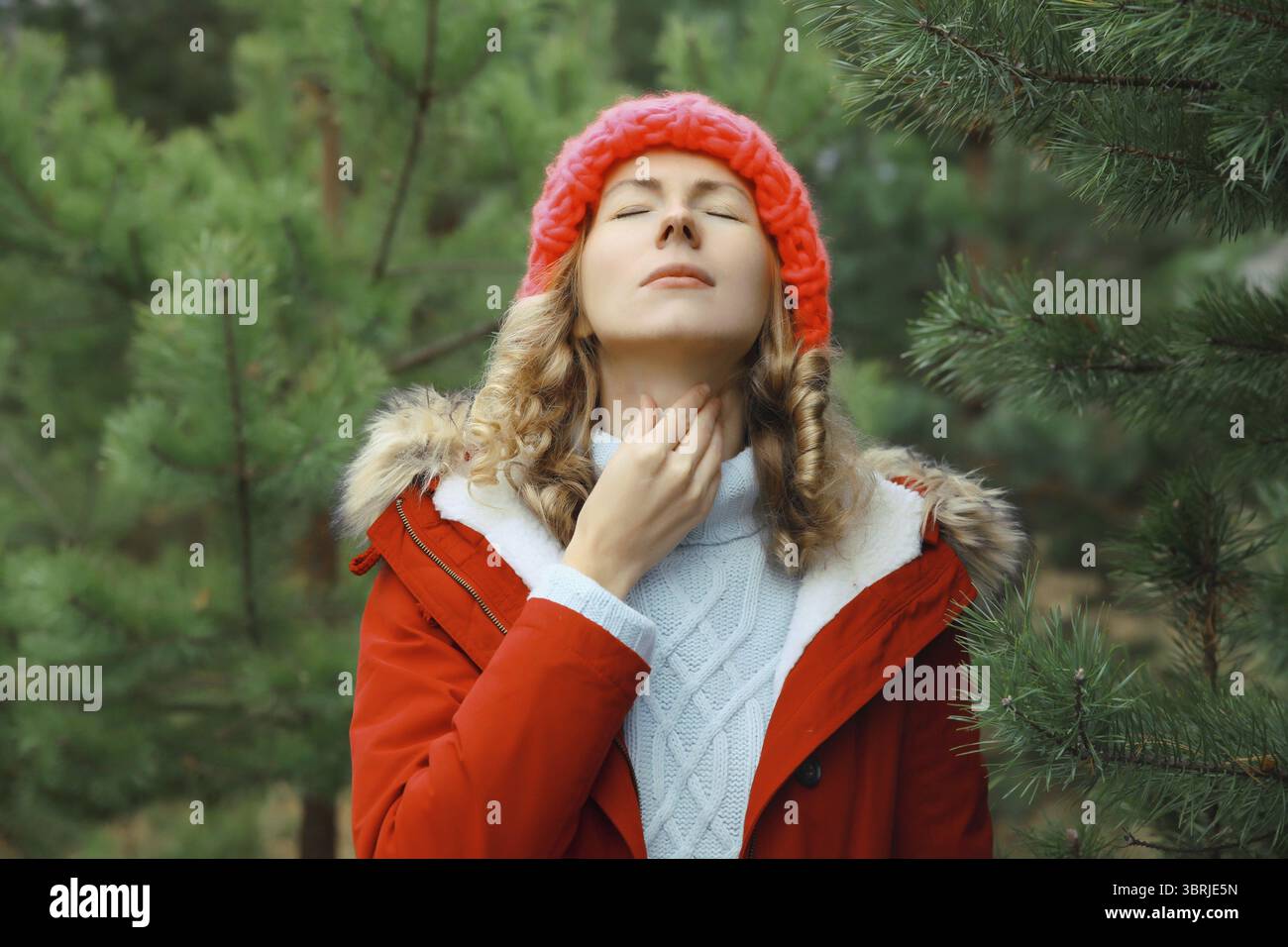 Sick exhausted young woman suffering from acute sore in throat flu ...