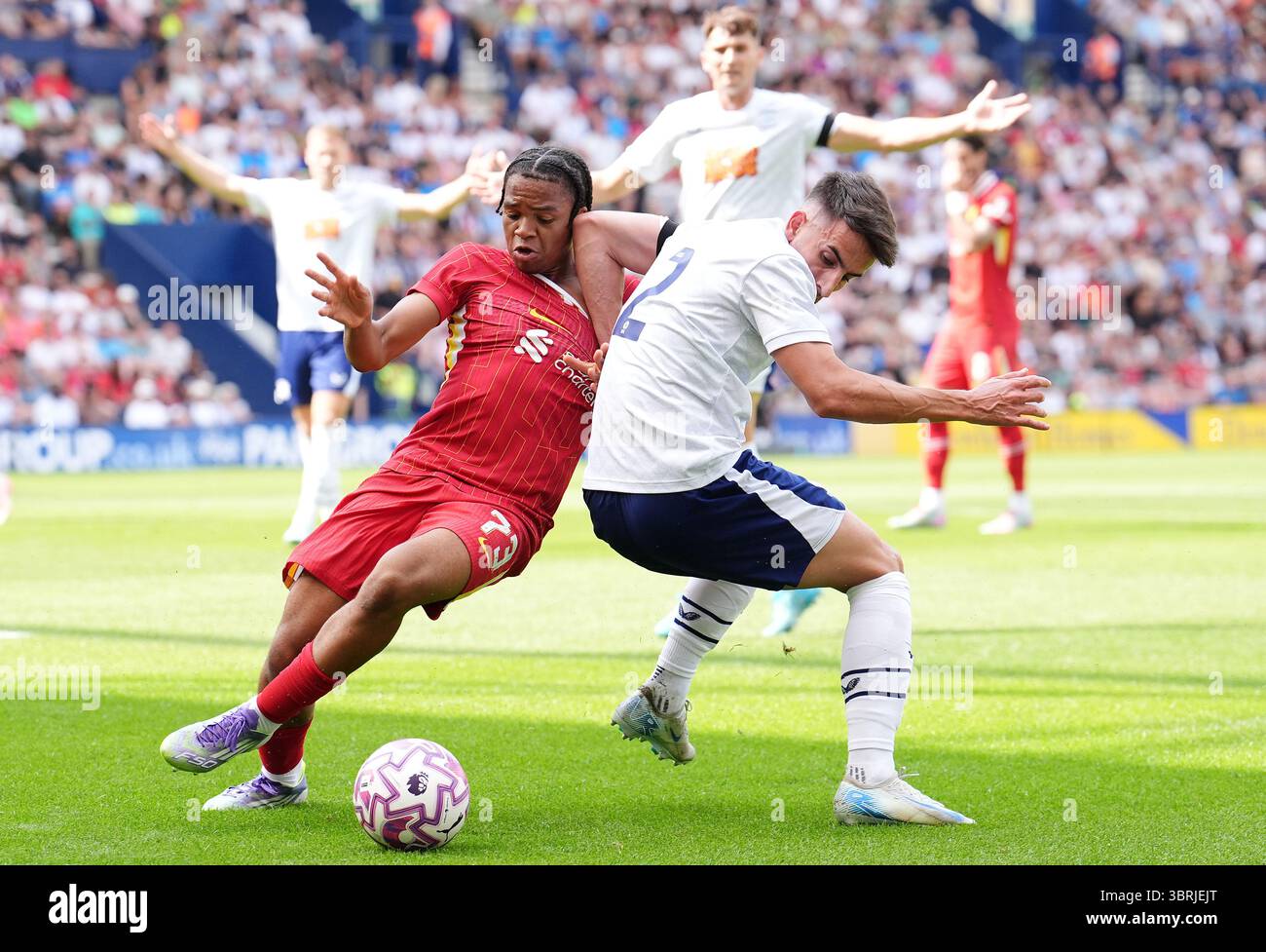 Preston North End's Pol Valentin and Liverpool's Rio Ngumoha battle for ...
