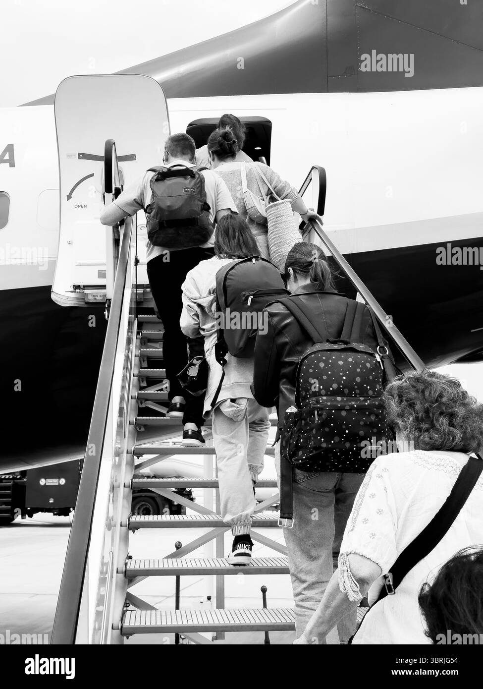 HAHN, GERMANY - JUNE 1, 2025 - Passengers carrying backpacks and bags ...