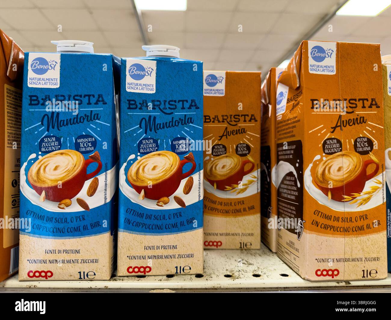 CALABRIA, ITALY - JUNE 4, 2025 - Cartons of BeneSi barista almond and ...