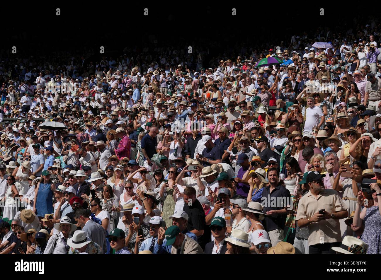 Crowds pack the stands of Centre Court before Italy's Jannik Sinner ...