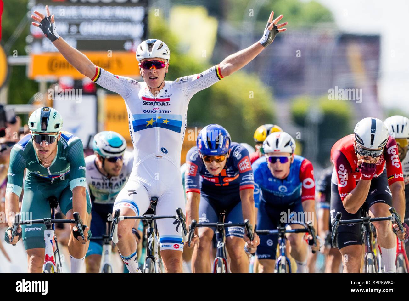 Belgian Tim Merlier of Soudal Quick-Step celebrates as he crosses the ...