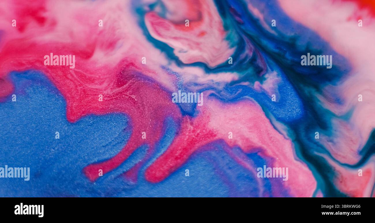 Spilling multicolor emulsion flowing paint hi-res stock photography and ...