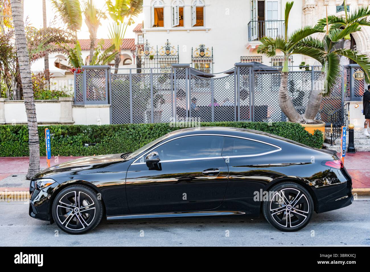 Miami, Florida, USA - April 08, 2025: Black car, side view. 2024 ...