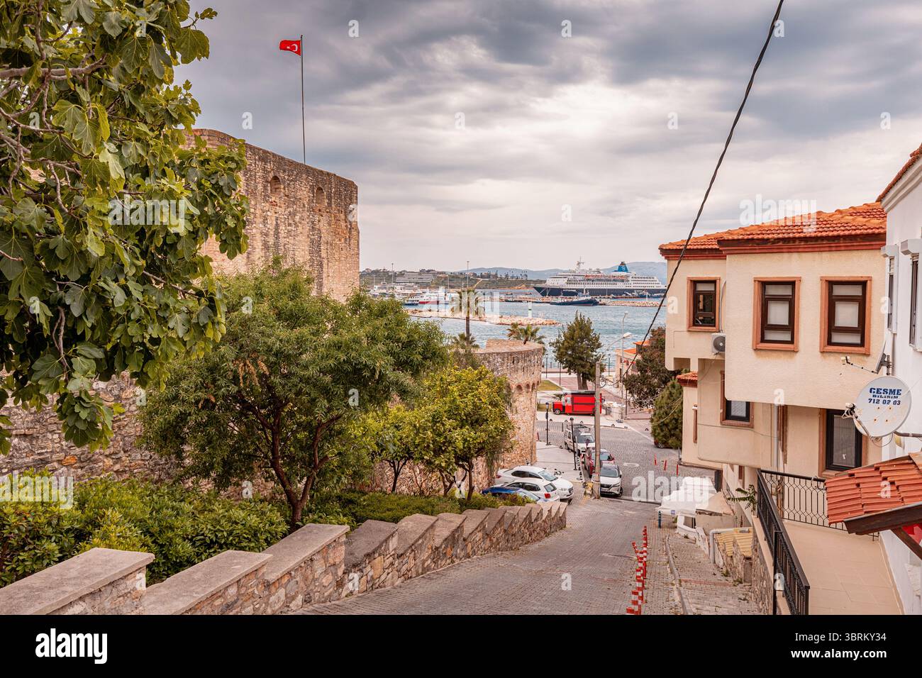 28 April 2025, Cesme, Turkiye: cityscape with its medieval castle ...