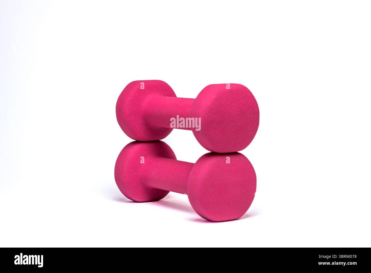 pink dumbbells isolated on white background Stock Photo - Alamy