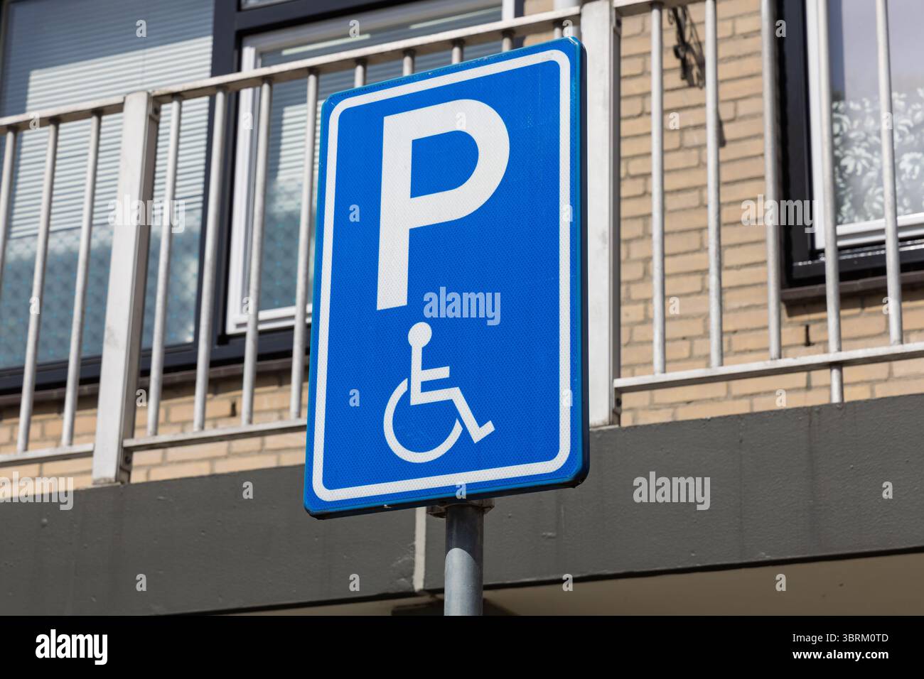Sign indicates designated parking hi-res stock photography and images ...