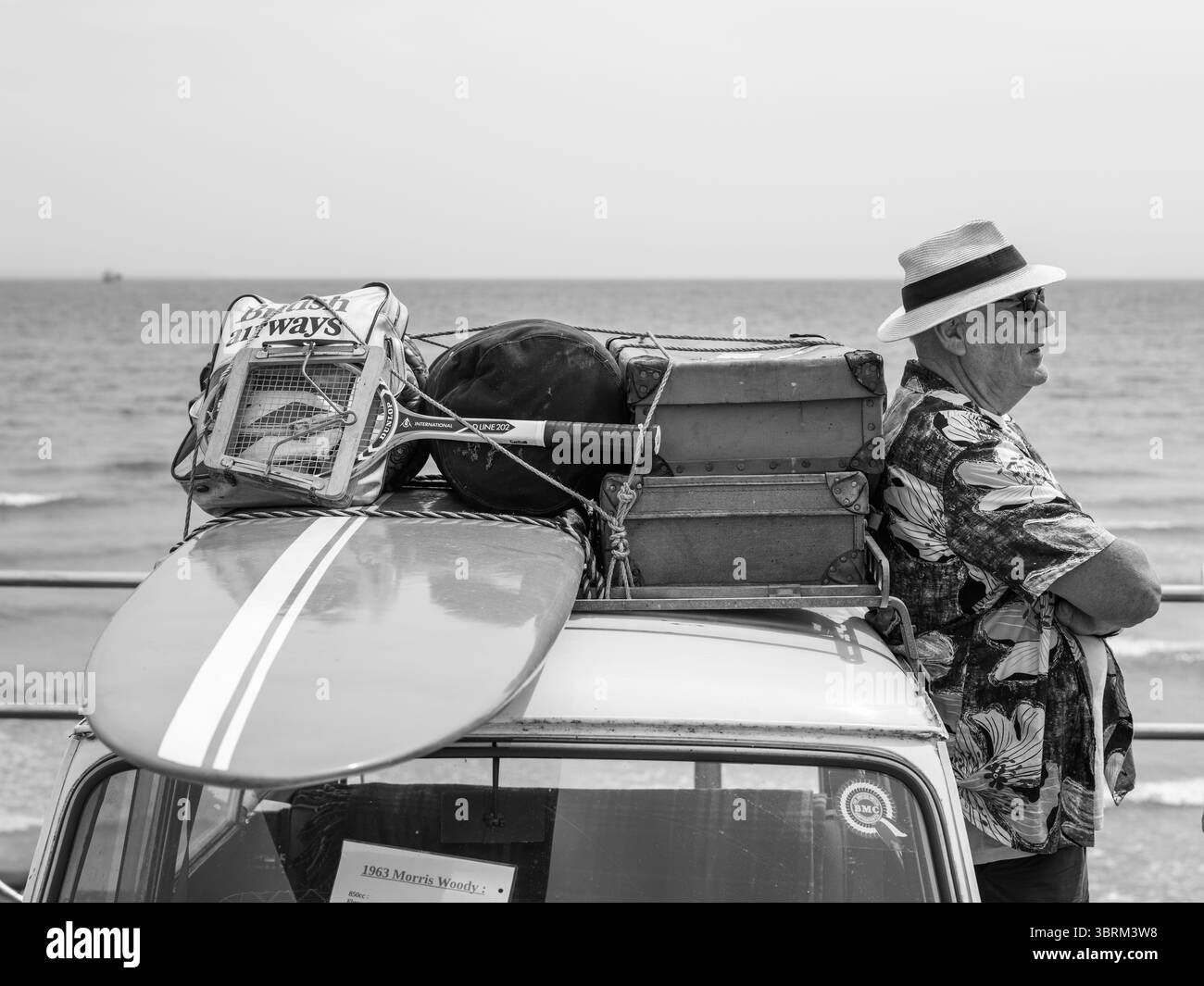 Leaning man in shirt Black and White Stock Photos & Images - Alamy
