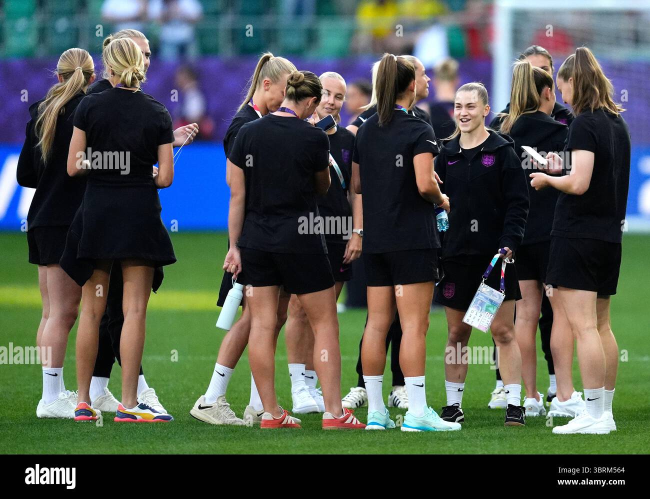 England's Jessica Park (fourth right, facing) and team-mates as they ...