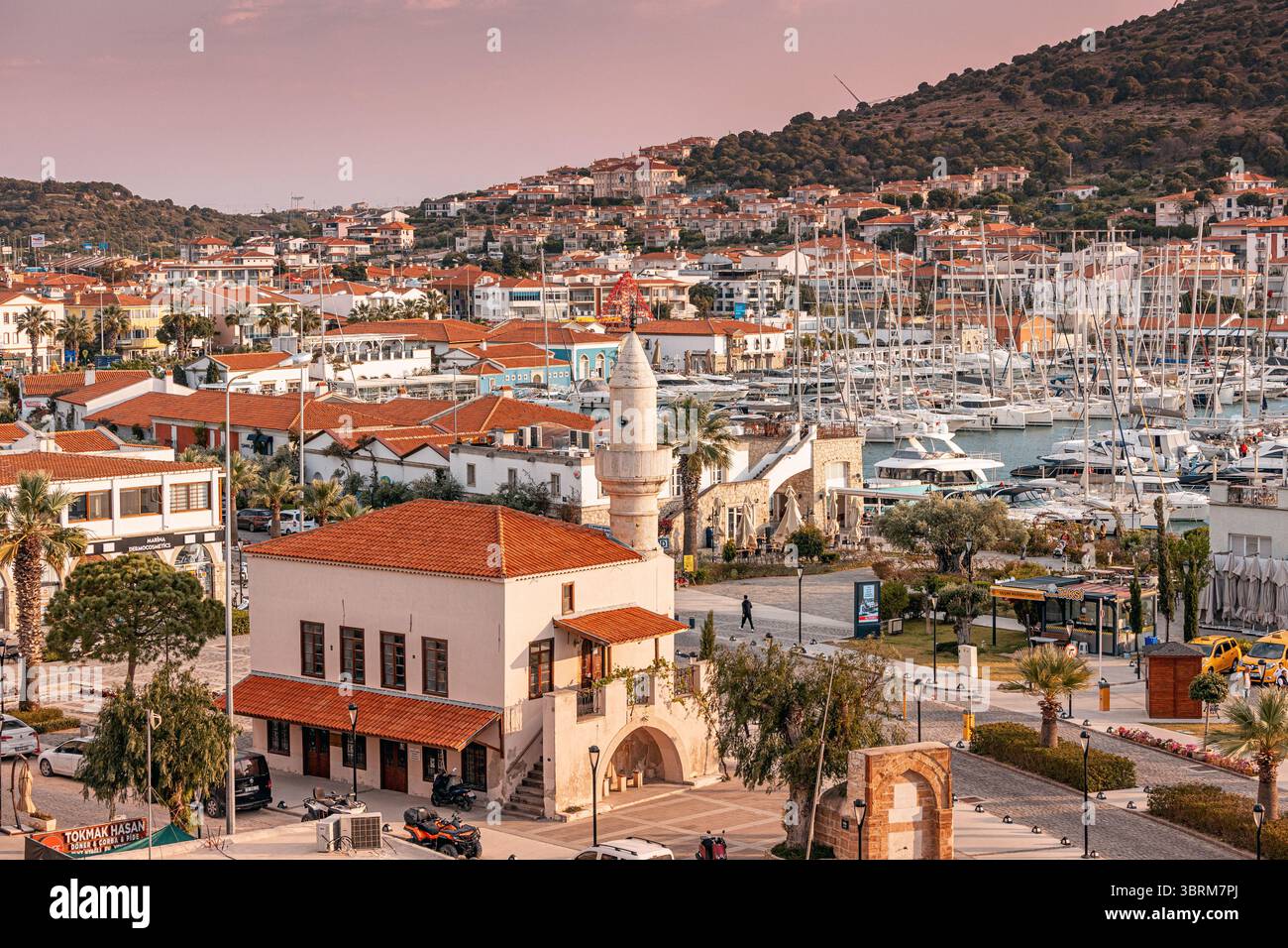 28 April 2025, Cesme, Turkiye: Aerial view of marina during golden hour ...