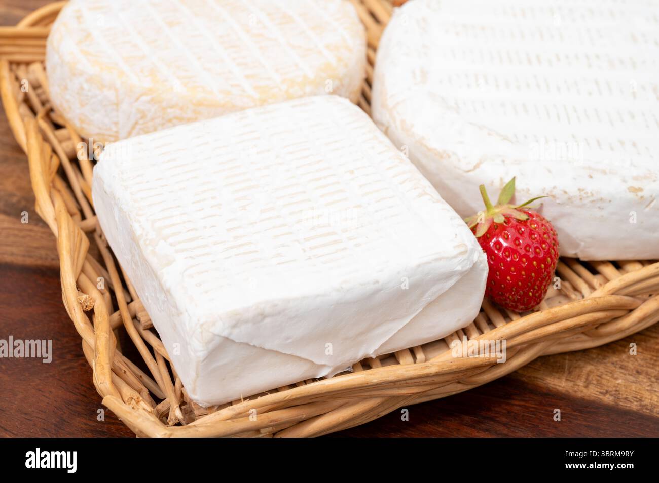French soft cheeses collection, variety of creamy cow's milk cheeses ...