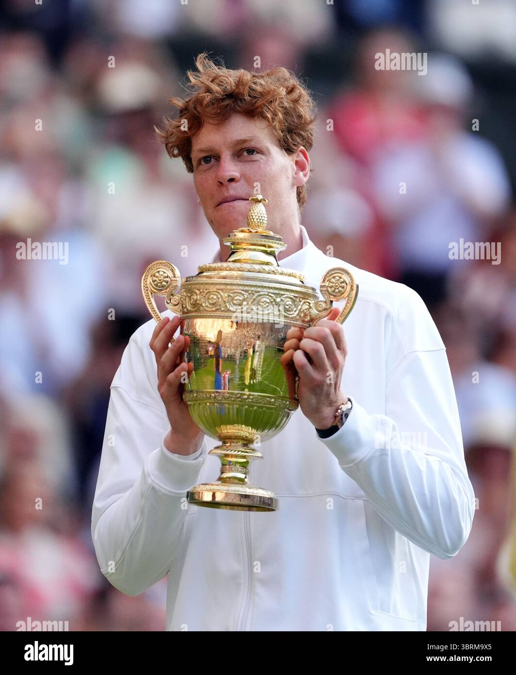 Jannik Sinner with the Gentlemen's Singles Trophy following his victory ...