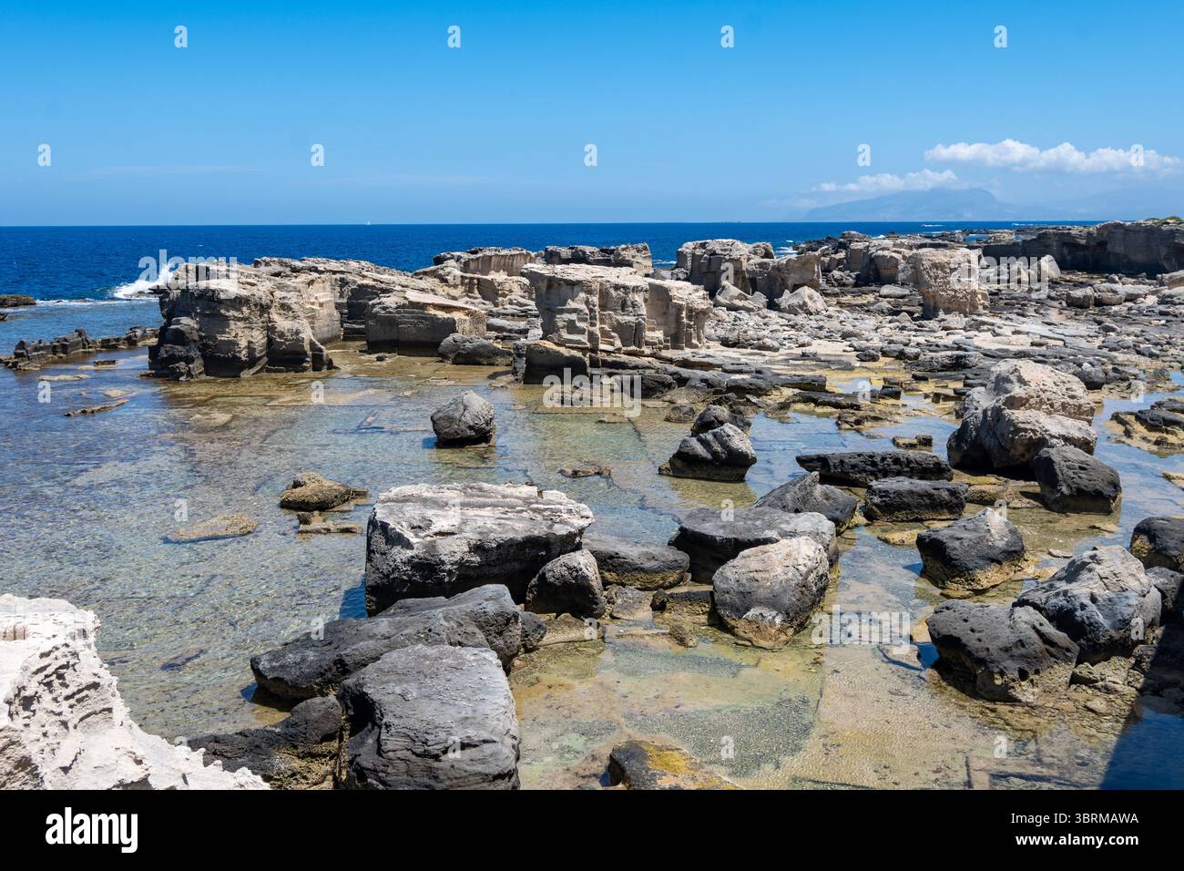 Coastline of Favignana island with tuff rocks, cultural heritage ...