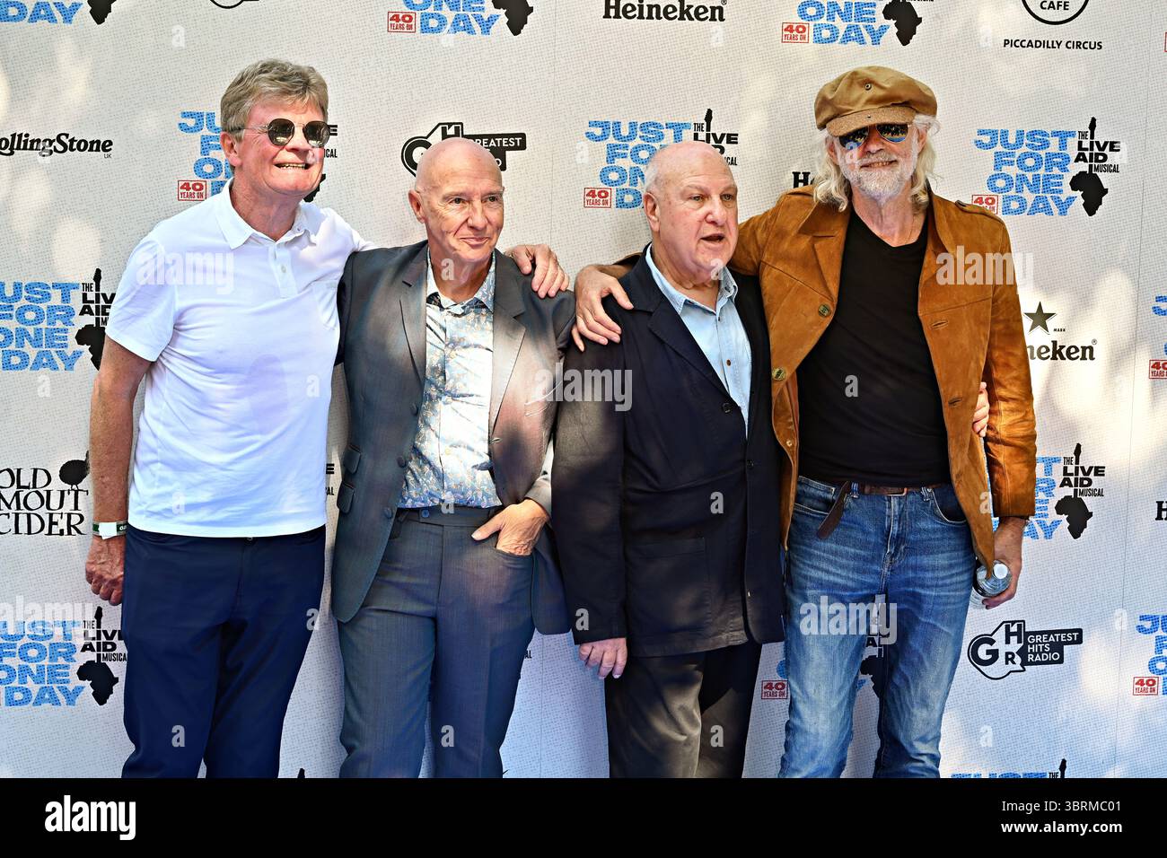 LONDON, ENGLAND - 13 July 2025: Midge Ure, Bob Geldof, Harvey Goldsmith ...