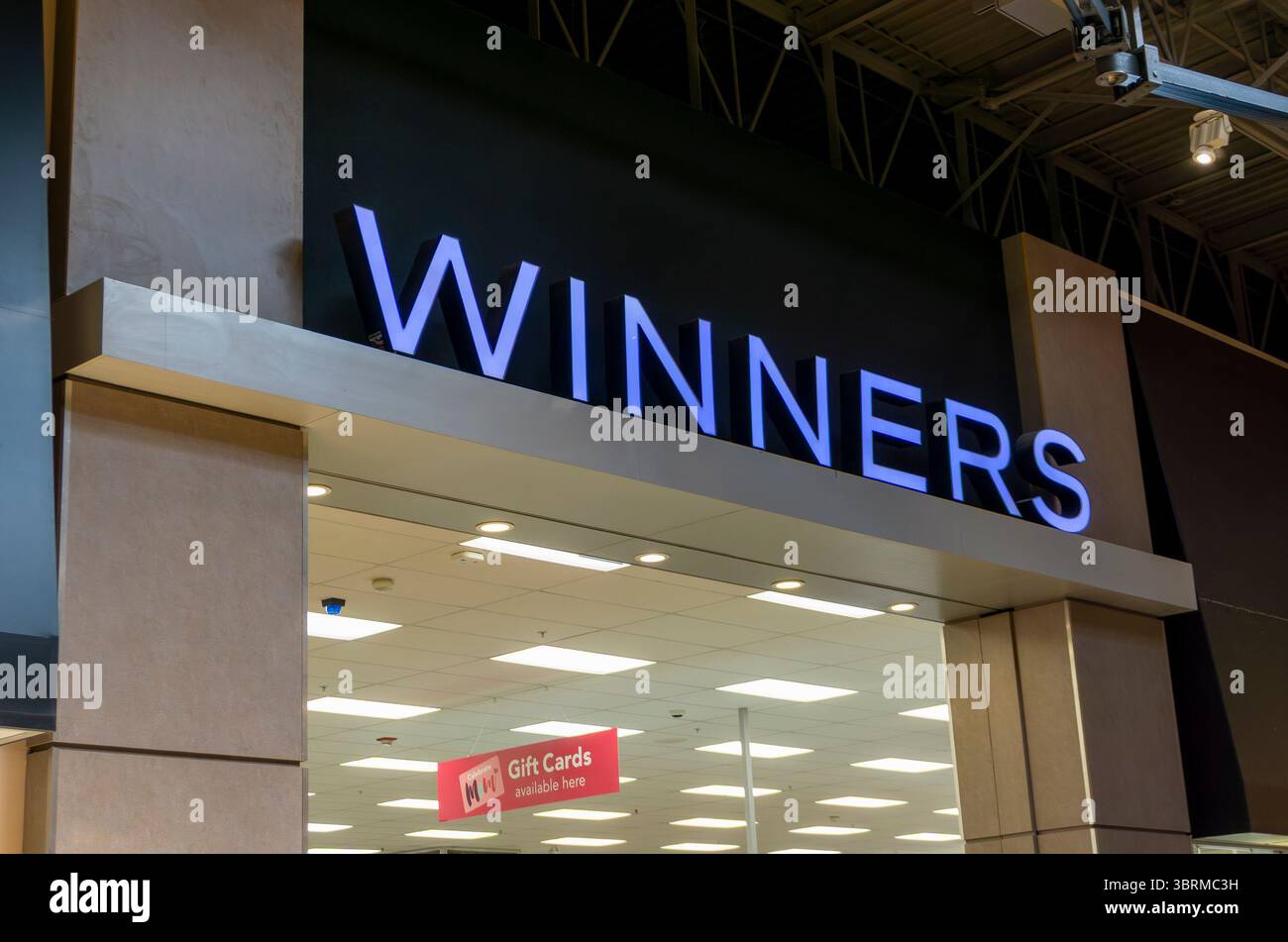 ROCKY VIEW, CANADA - MAY 2, 2025: Entrance logo of Winners at Rocky ...