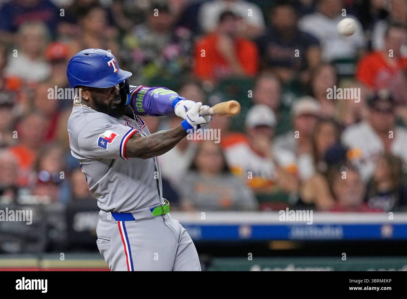 Texas Rangers' Adolis García hits a home run against the Houston Astros ...