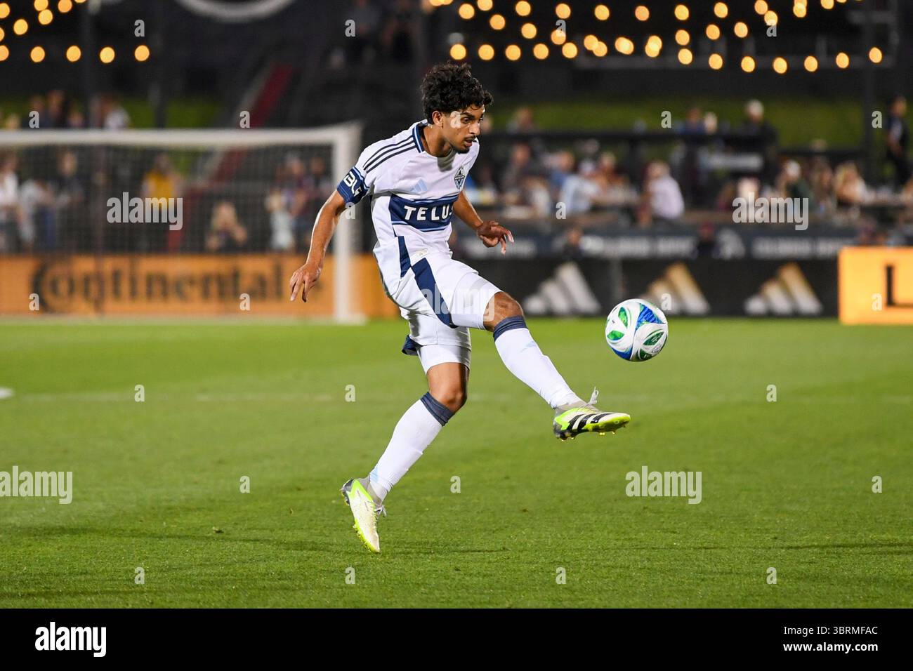 July 12, 2025: Vancouver midfielder Jeevan Badwal (59) brings the ball ...